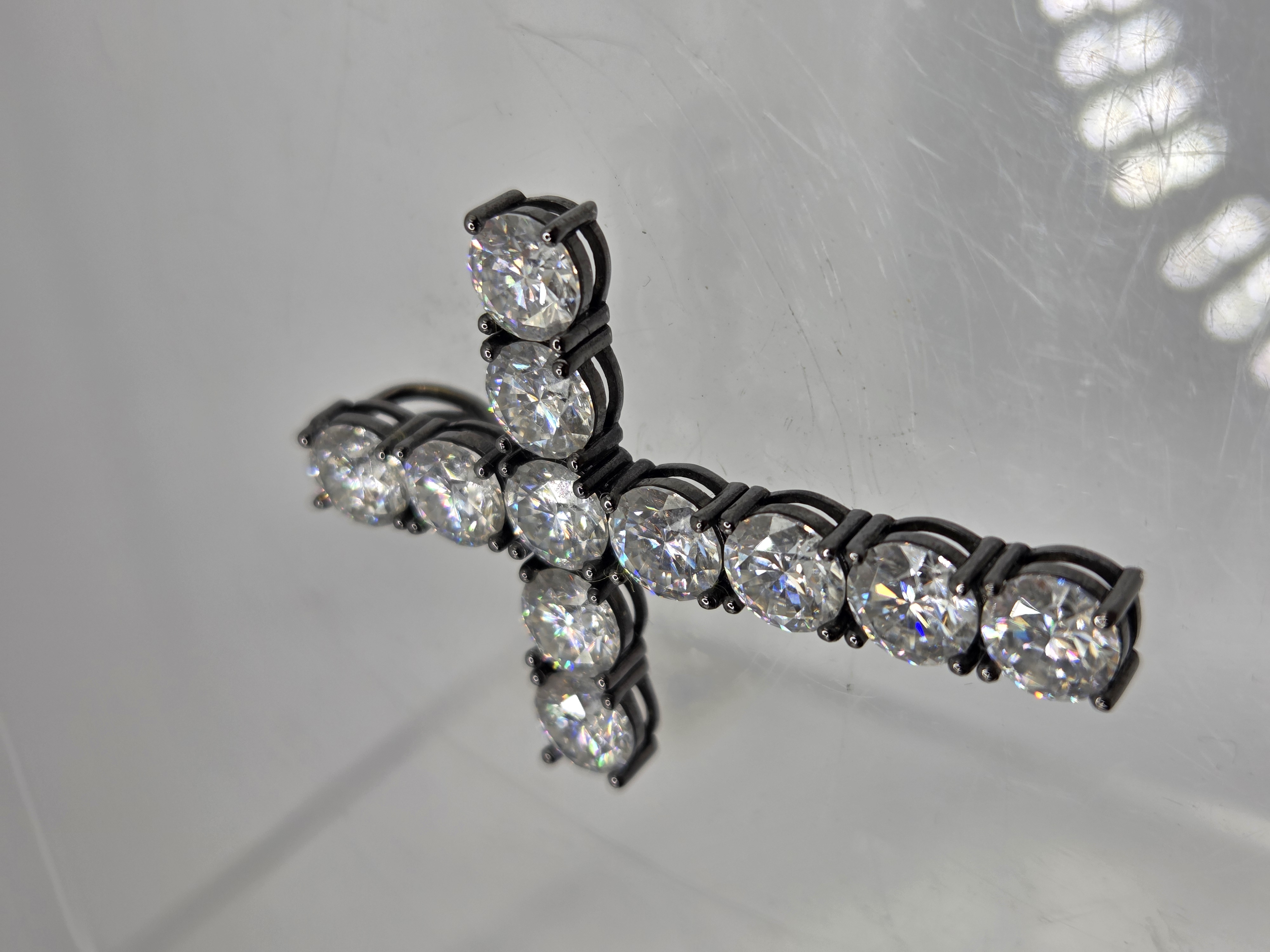 Moissanite tennis cross pendant, black rhodium-plated sterling silver ...